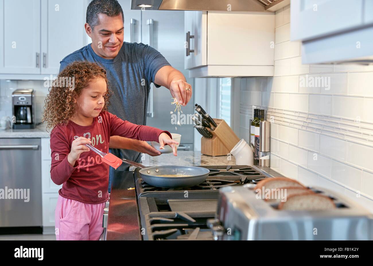 Helping cook hi-res stock photography and images - Alamy
