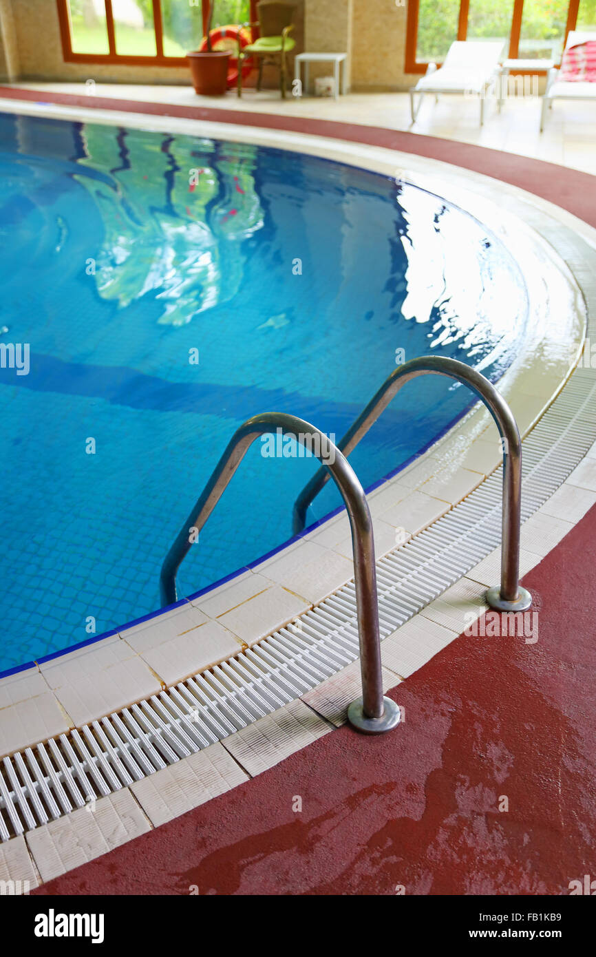 swimming pool is round shape, indoors Stock Photo - Alamy