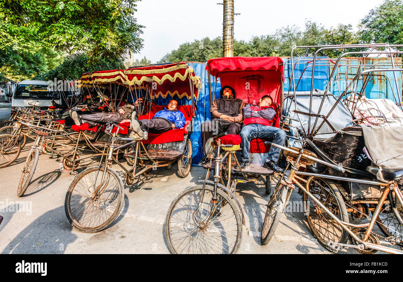 Rickshaw drivers on a break after taking tourist on a tour in the ...