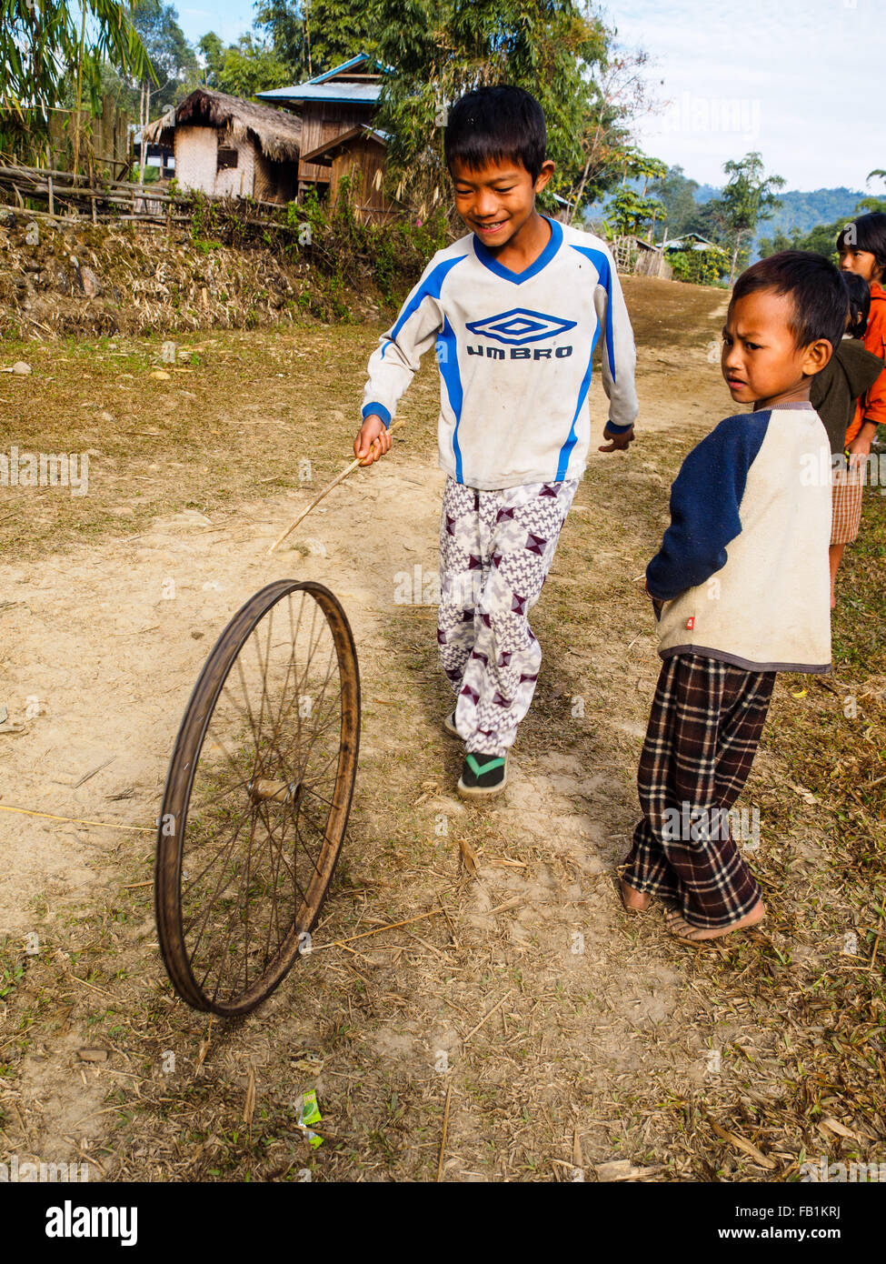 Lisu kids playing together in the morning, Northern Myanmar Stock Photo ...