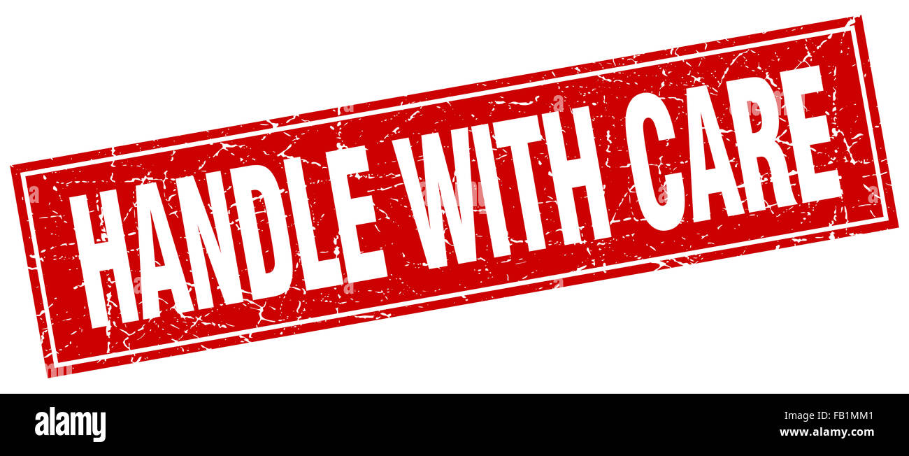 handle with care red square grunge stamp on white Stock Photo - Alamy