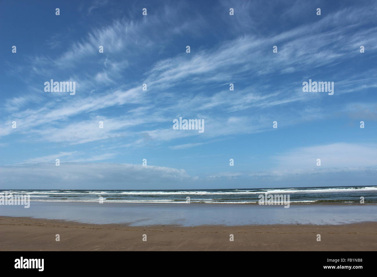 Reflective Summer Beach Day Stock Photo - Alamy