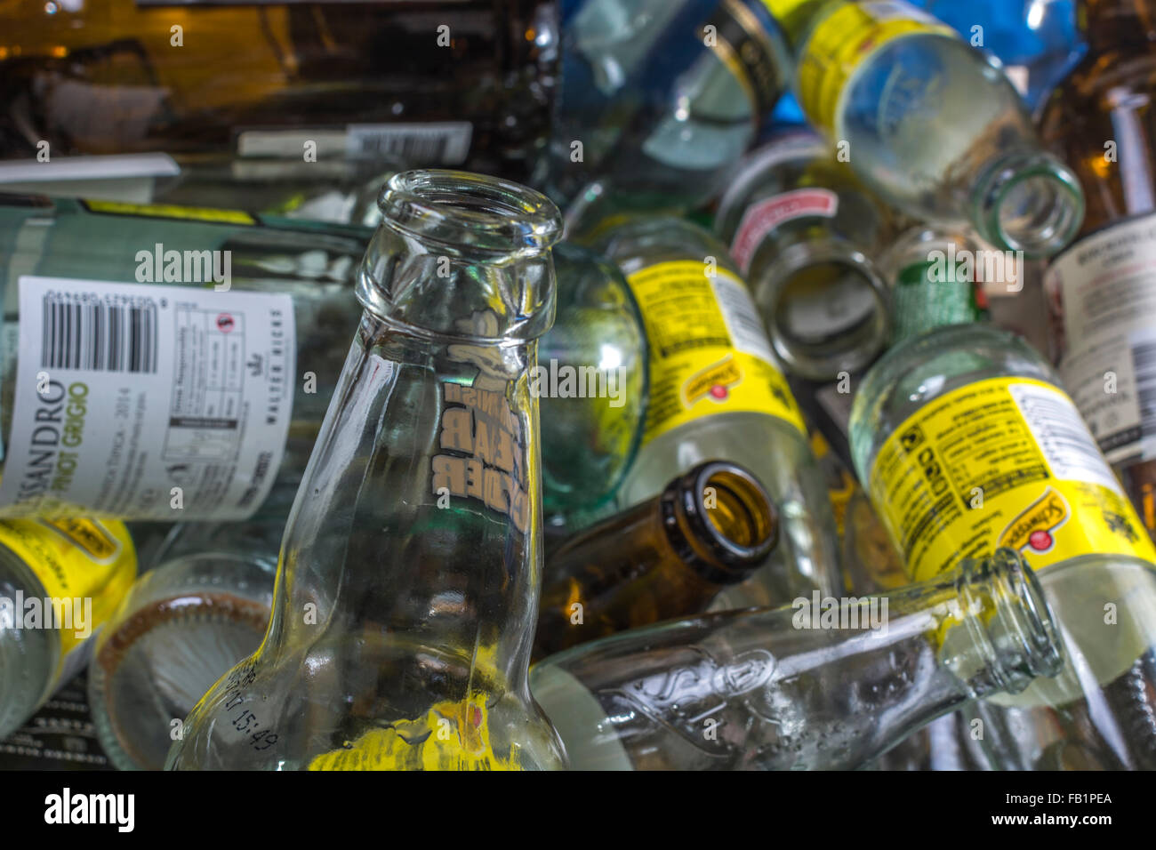 Batch of empty bottles in pub bottle bank Stock Photo - Alamy