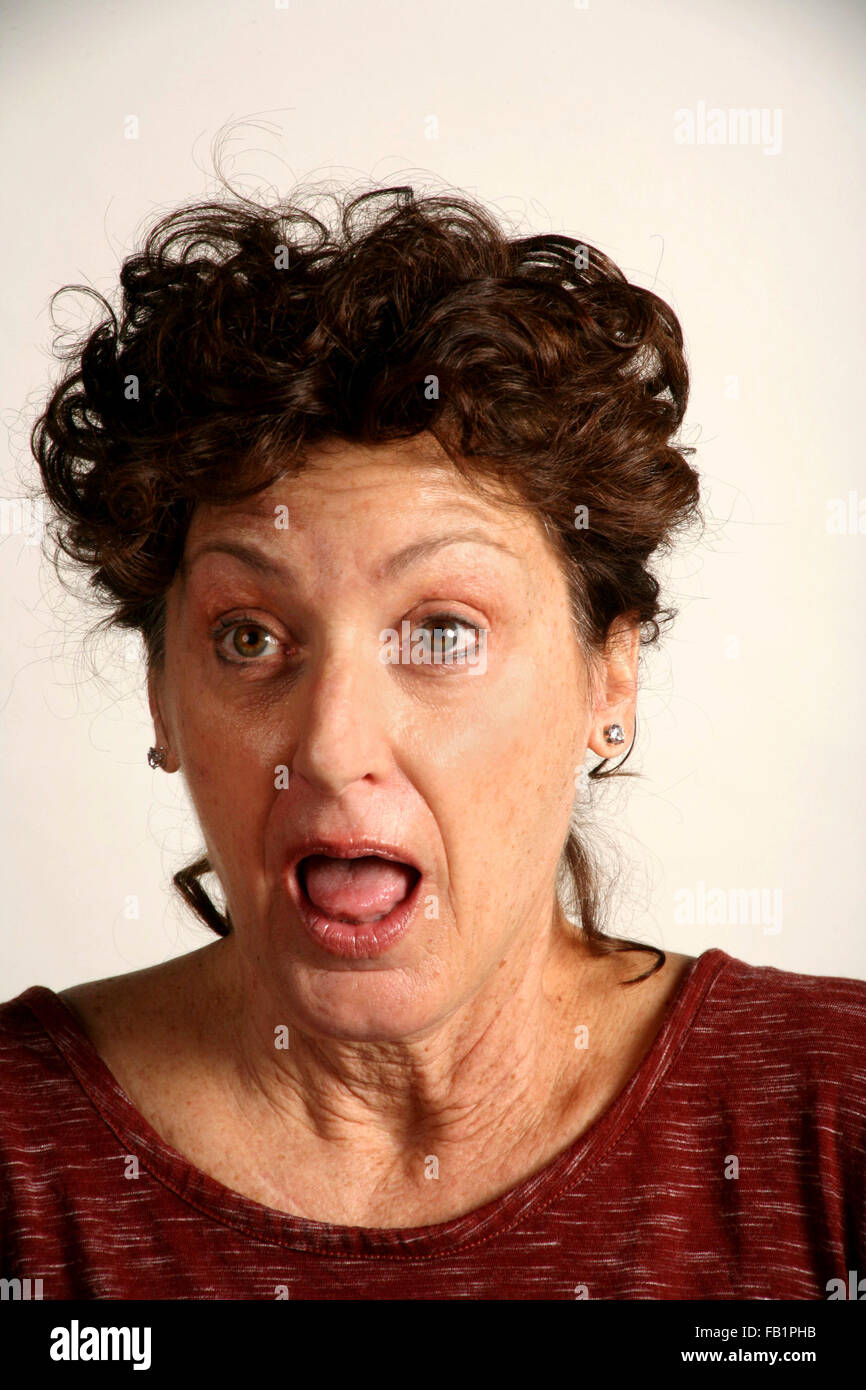 An adult woman imitates the expressions of a baby Stock Photo - Alamy