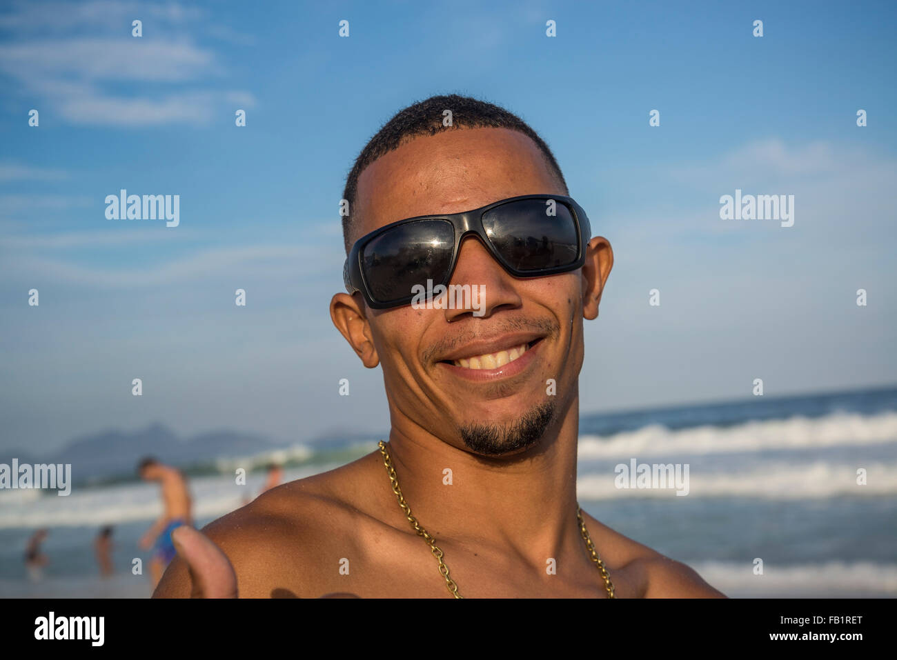 Copacabana beach, Young man posing, Rio de Janeiro, Brazil Stock Photo ...