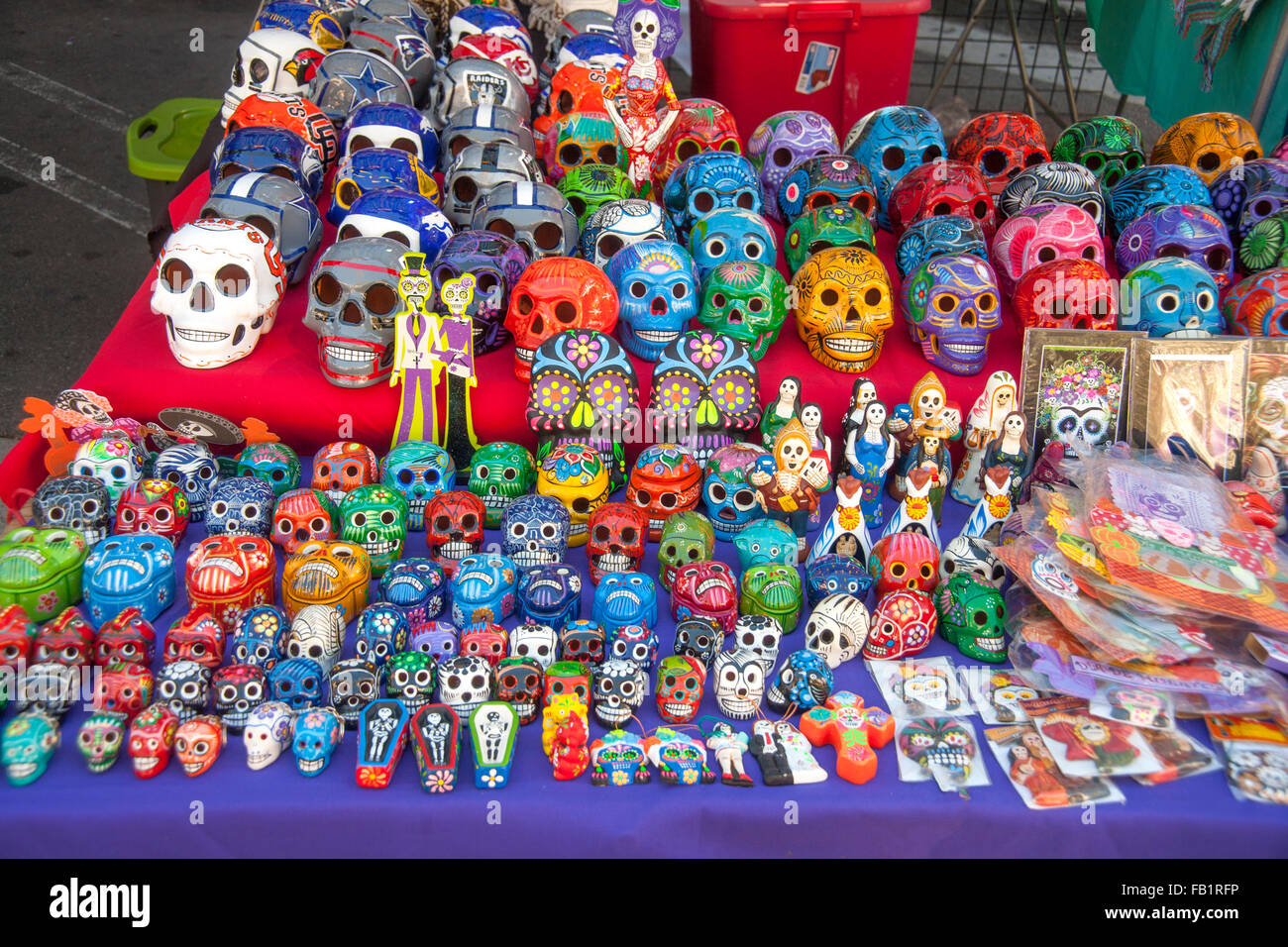 Colorfully decorated skull models or calacas are displayed at Day of ...