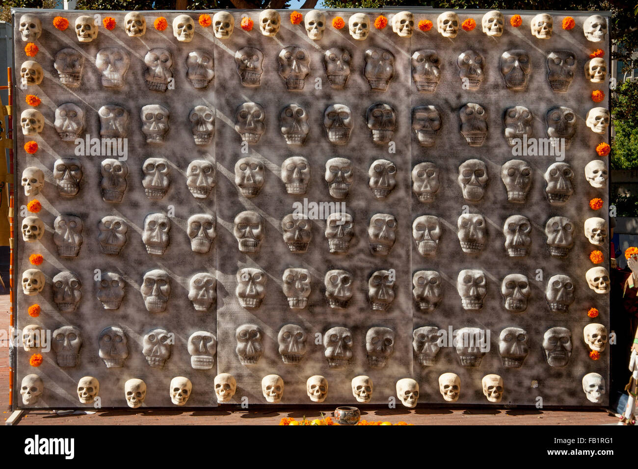 A bas relief of skull models or calacas are displayed at Day of the ...