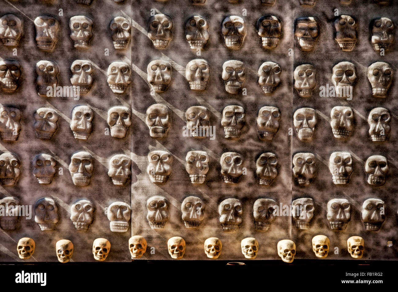 A bas relief of skull models or calacas are displayed at Day of the ...