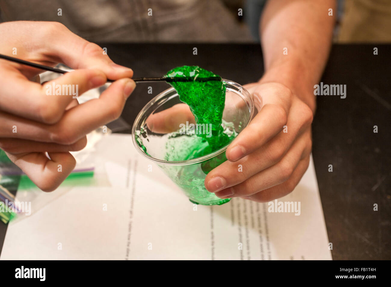 A mixture of polyvinyl alcohol and potassium borate with green ...