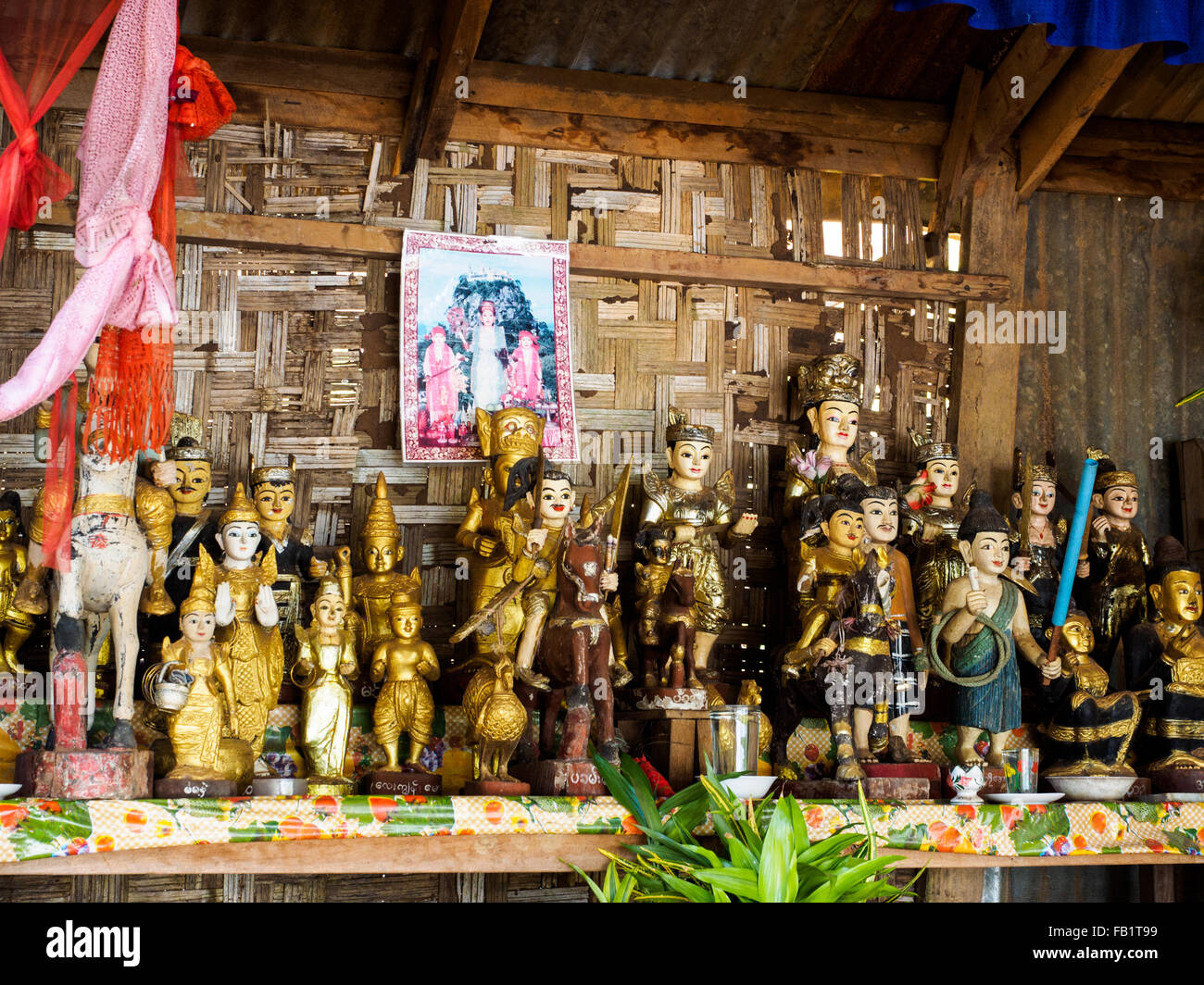 Burmese nats in front of a temple at Indawgyi Lake, Kachin State ...