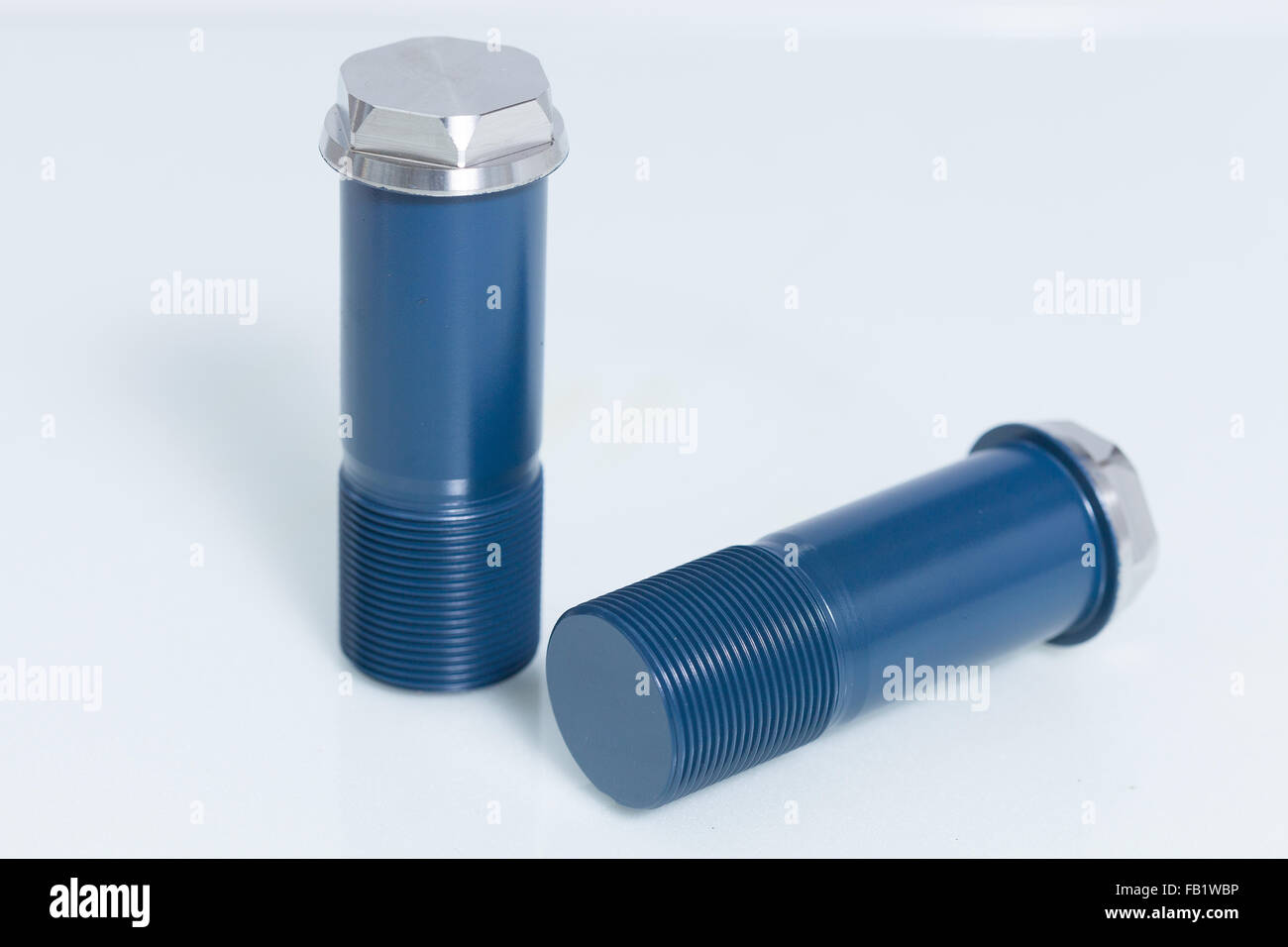 Threaded blue painted bolts on an isolated background Stock Photo - Alamy