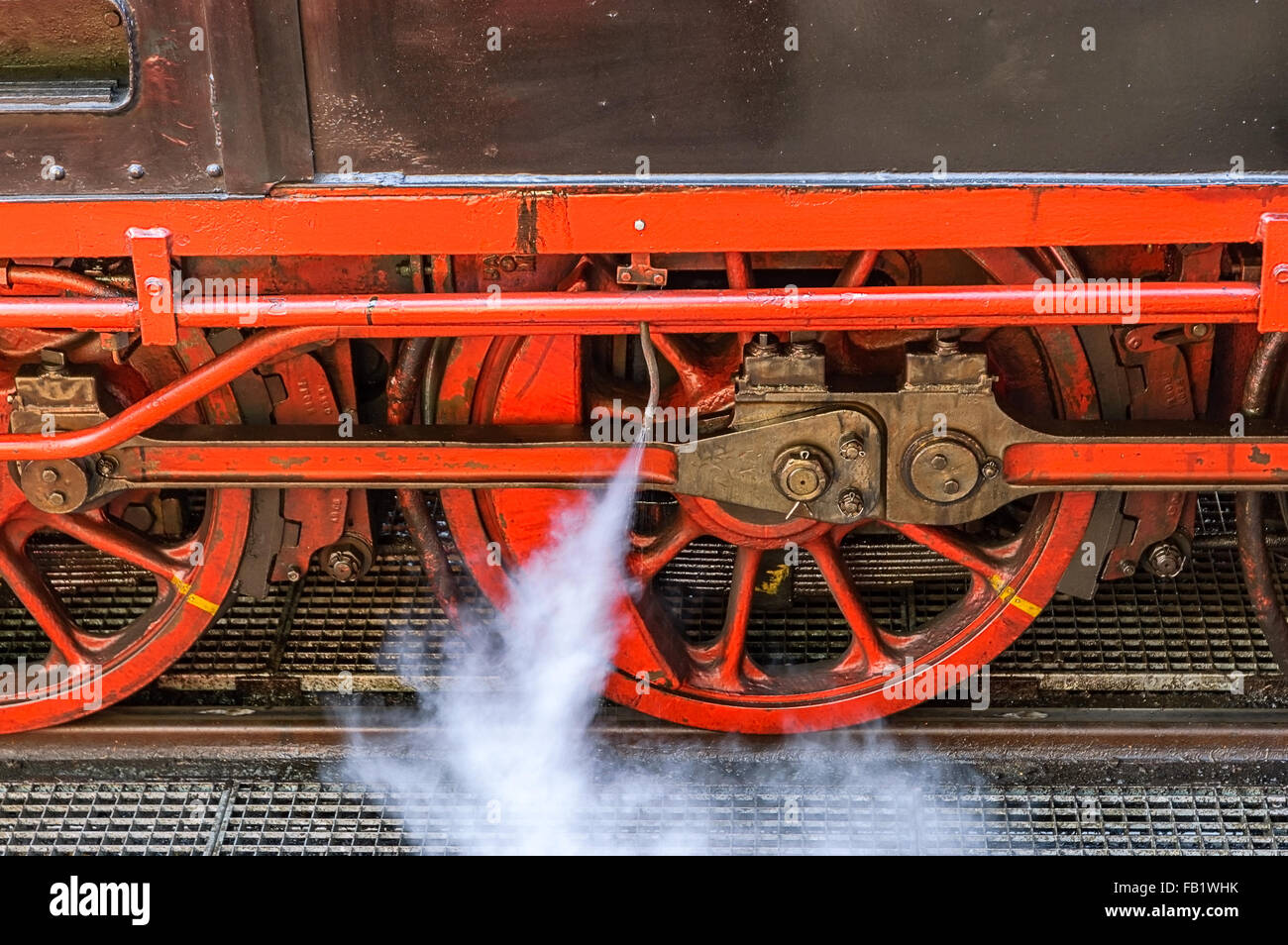 Close up of steam locomotive with connection rod and gear Stock Photo ...