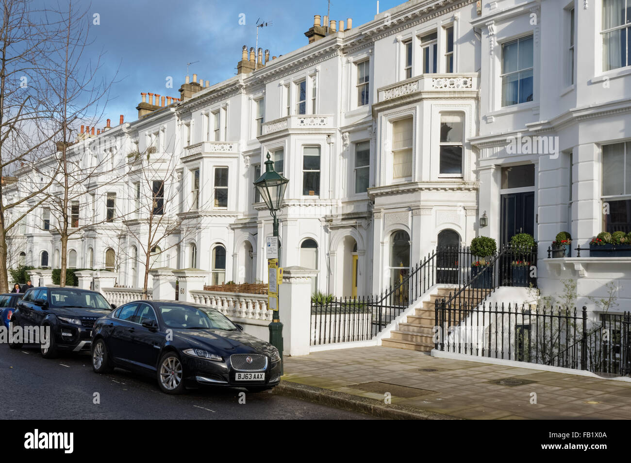 Luxury houses on Palace Gardens Terrace, residential street in ...