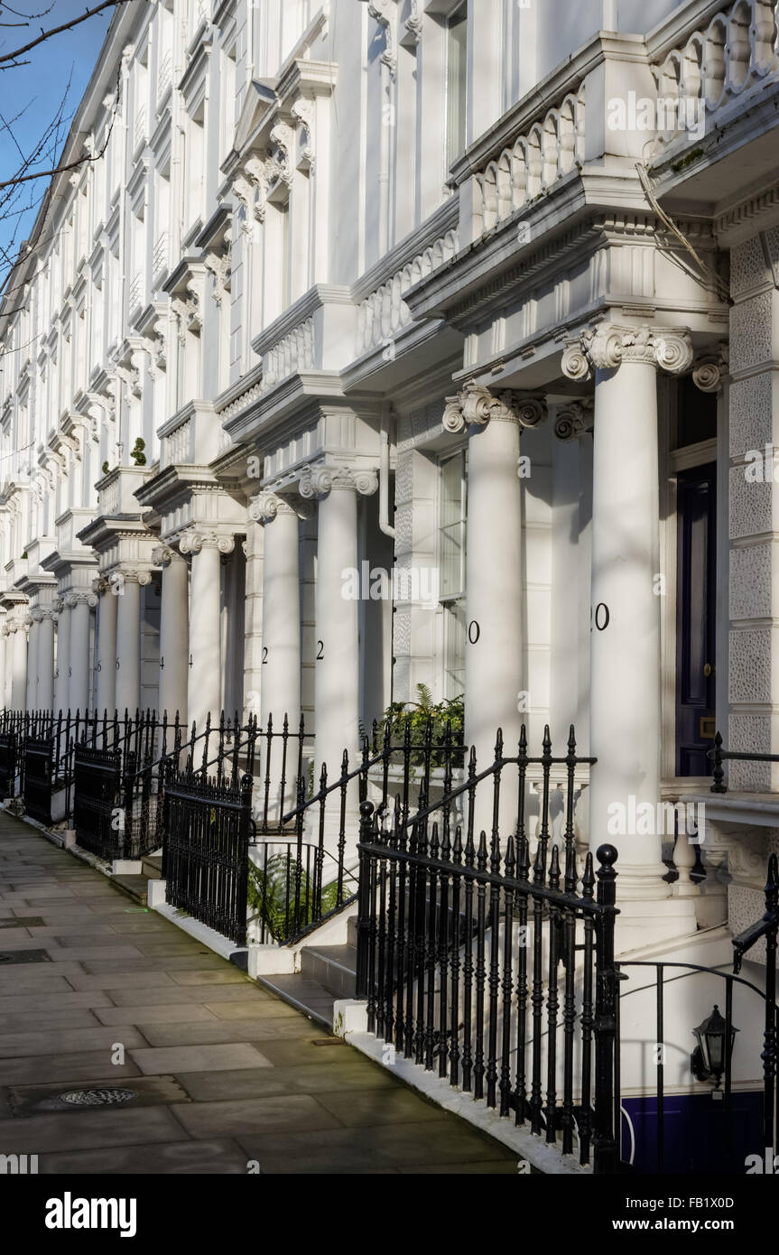 Georgian terraced town houses on Palace Gardens Terrace, London England ...