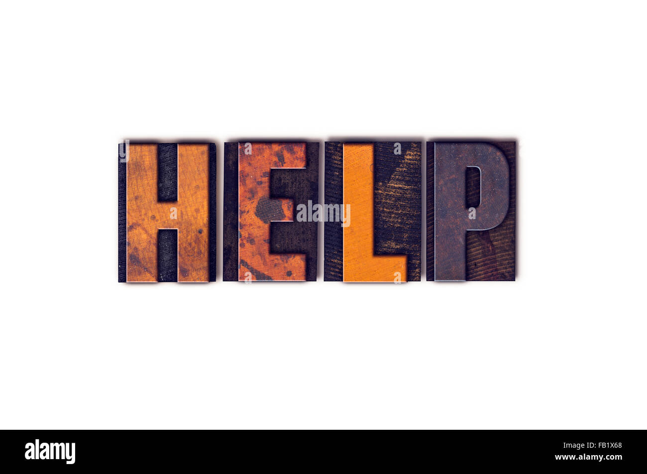 The word "Help" written in isolated vintage wooden letterpress type on ...