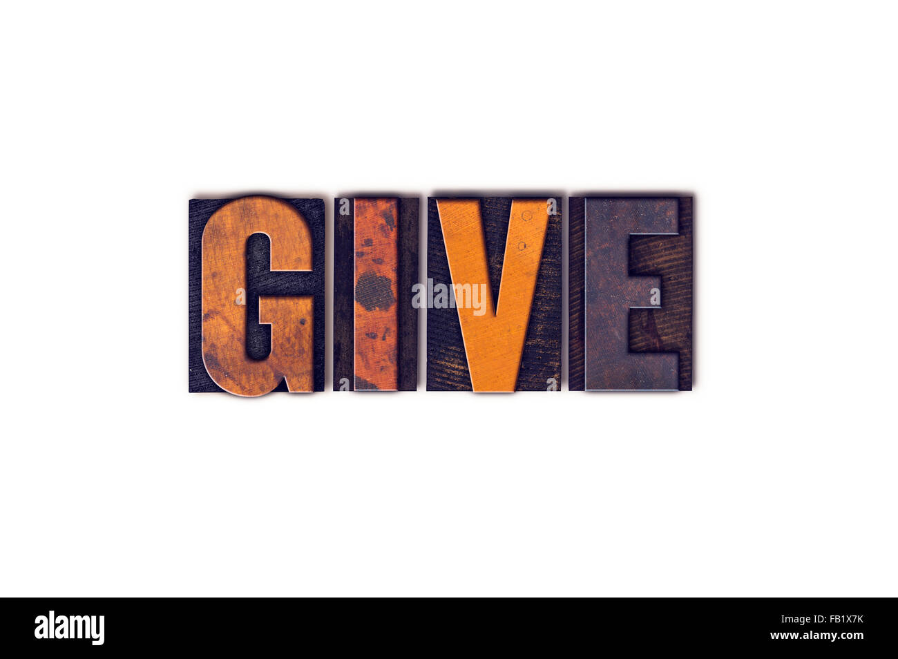 The word "Give" written in isolated vintage wooden letterpress type on ...