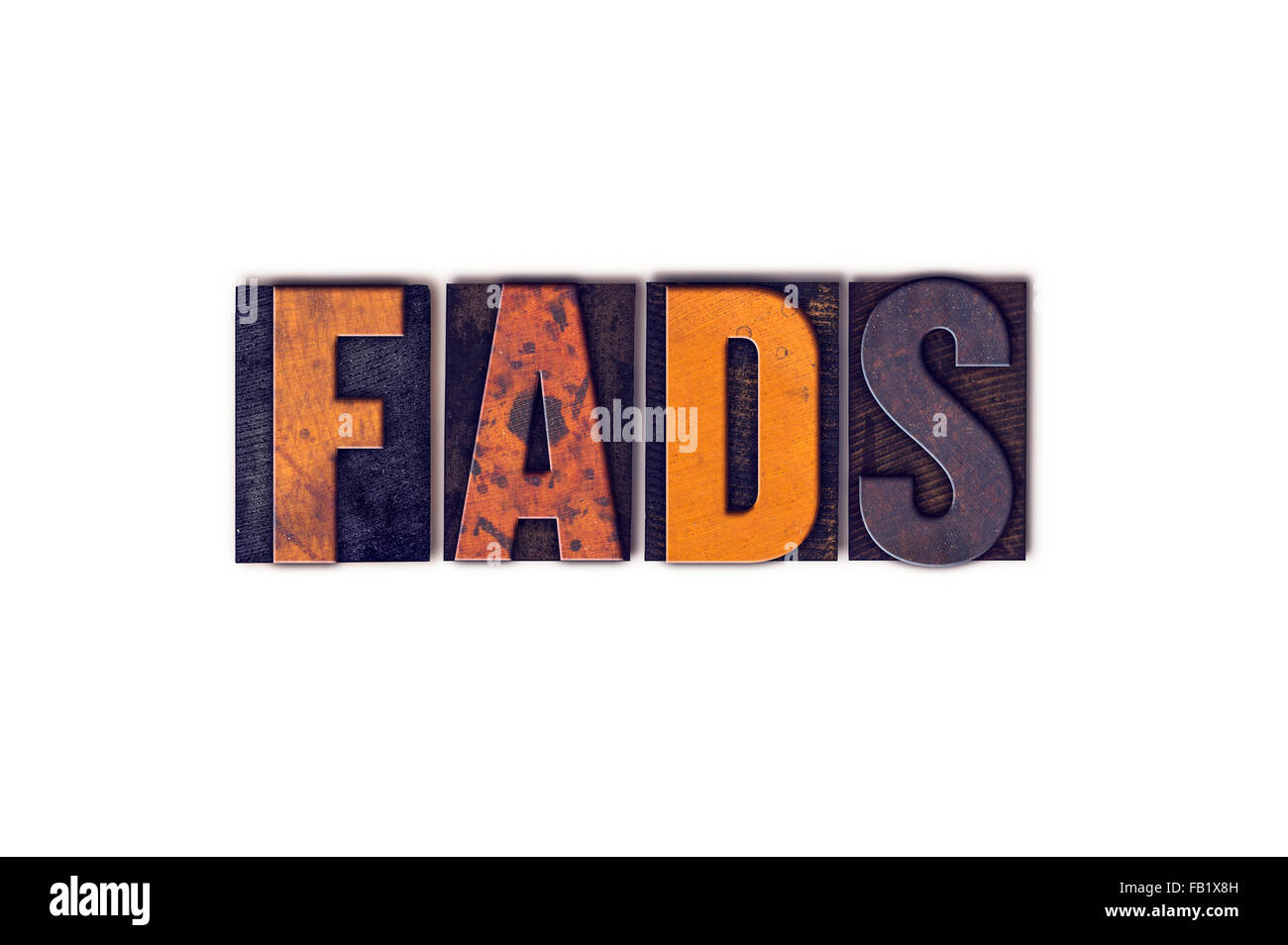The word "Fads" written in isolated vintage wooden letterpress type on ...