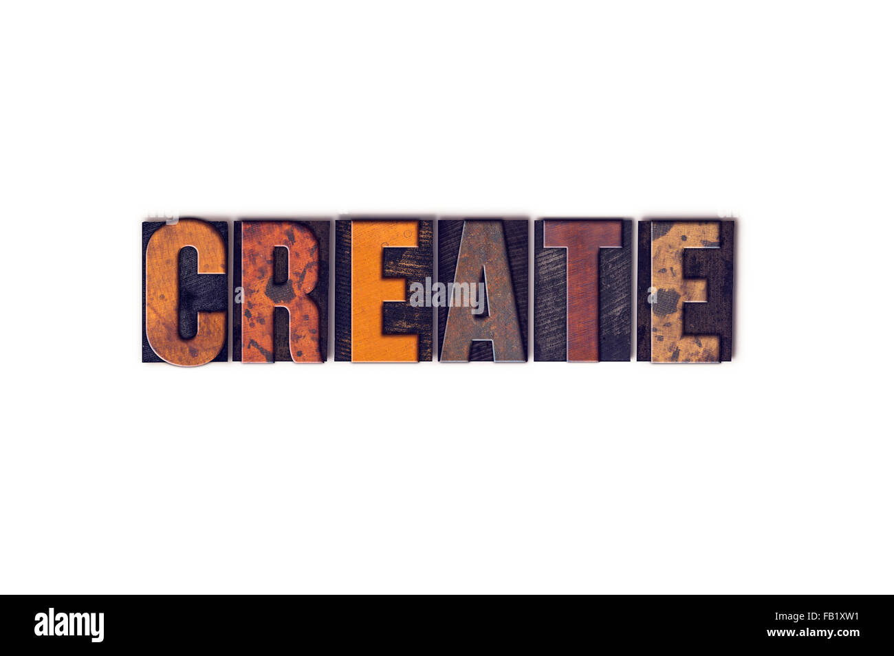 The word "Create" written in isolated vintage wooden letterpress type ...