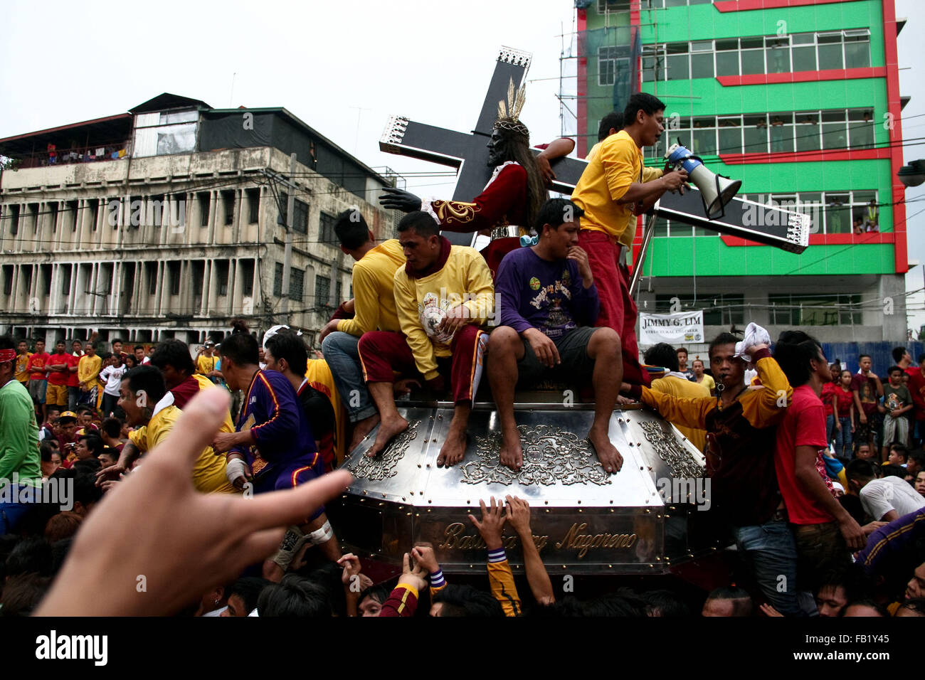 Manila, Philippines. 07th Jan, 2016. A devotee raises his hand as a ...