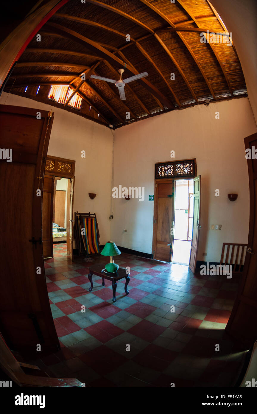 Interior of old colonial house with wood ceiling and tile floor Stock ...