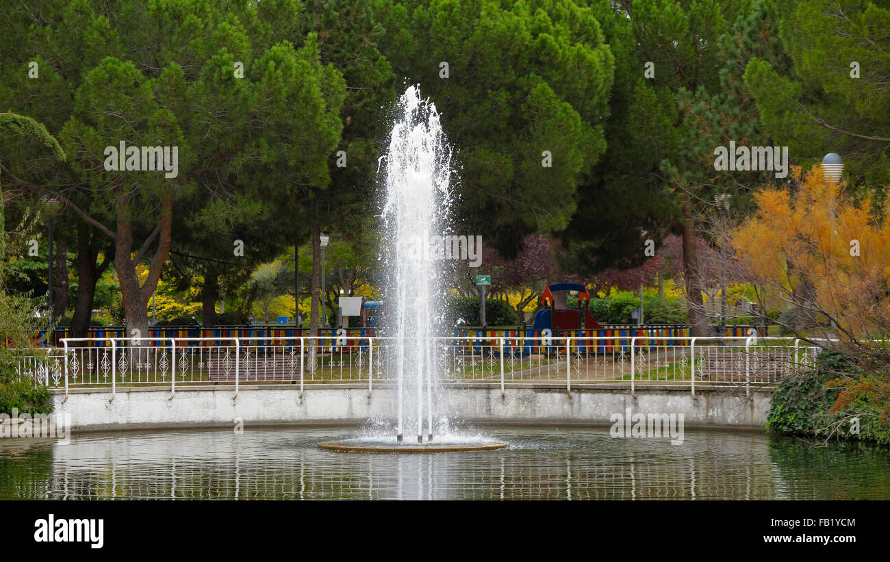 fountain in the pond of a recreational area in the city of Coslada in ...