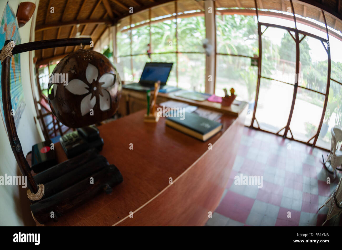 Lobby entrance of a cute hostel with lamp, laptop and front door Stock ...