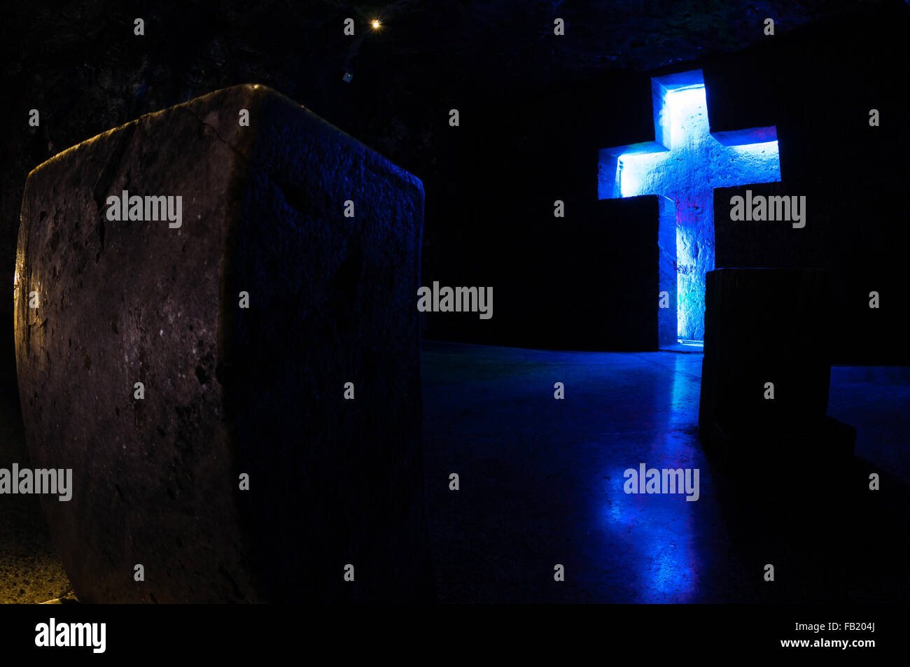 Tombstone and cross with blue light in salt cathedral Zipaquira Stock ...