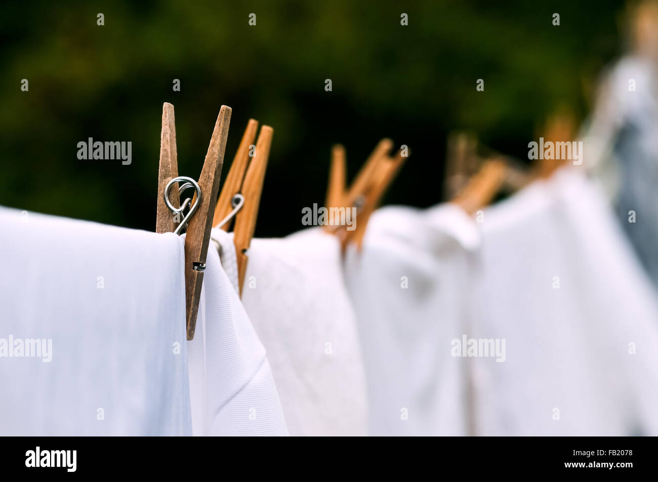 Eco-friendly washing line white laundry drying outdoors Stock Photo - Alamy