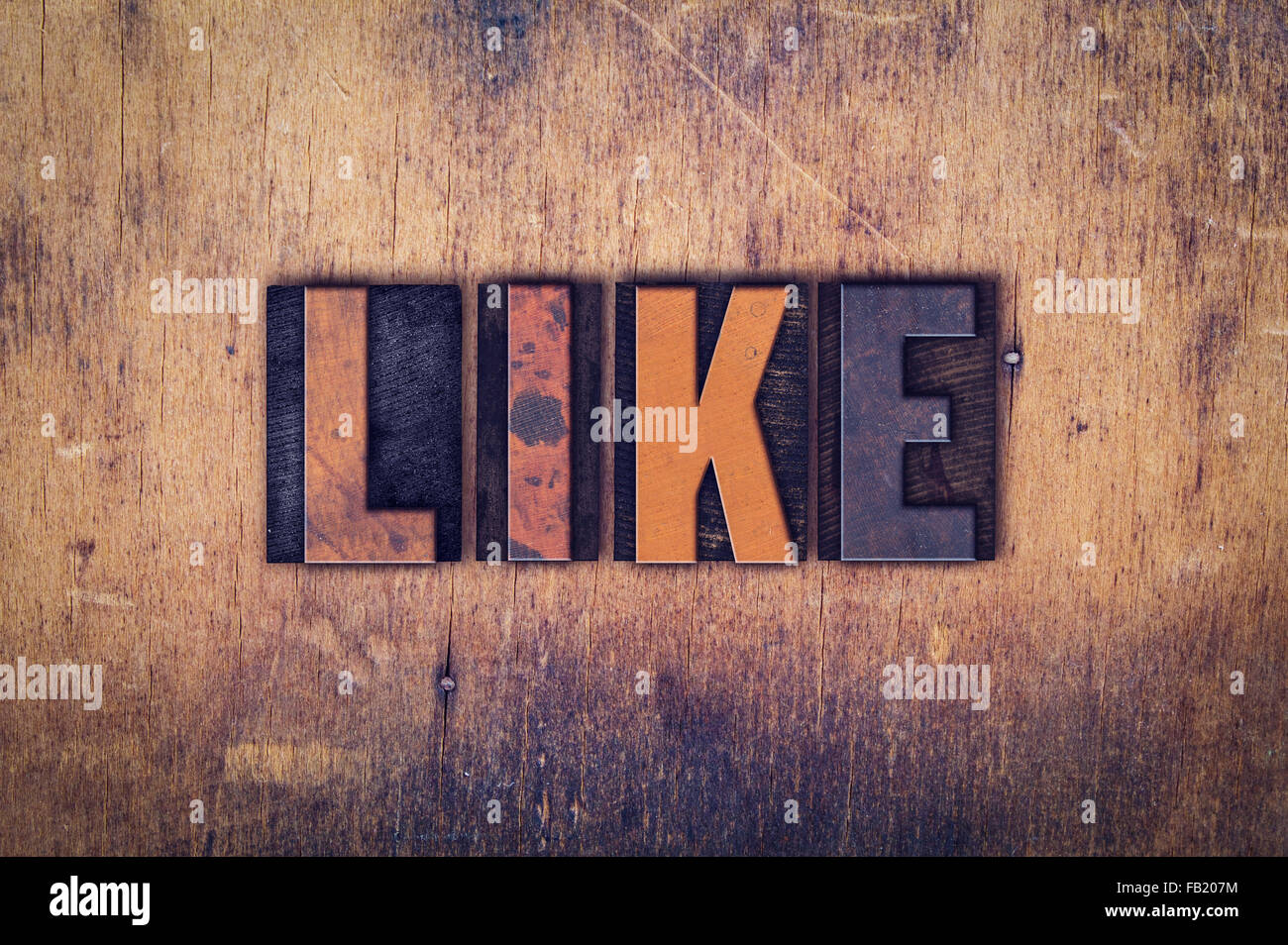 The word "Like" written in dirty vintage letterpress type on a aged ...