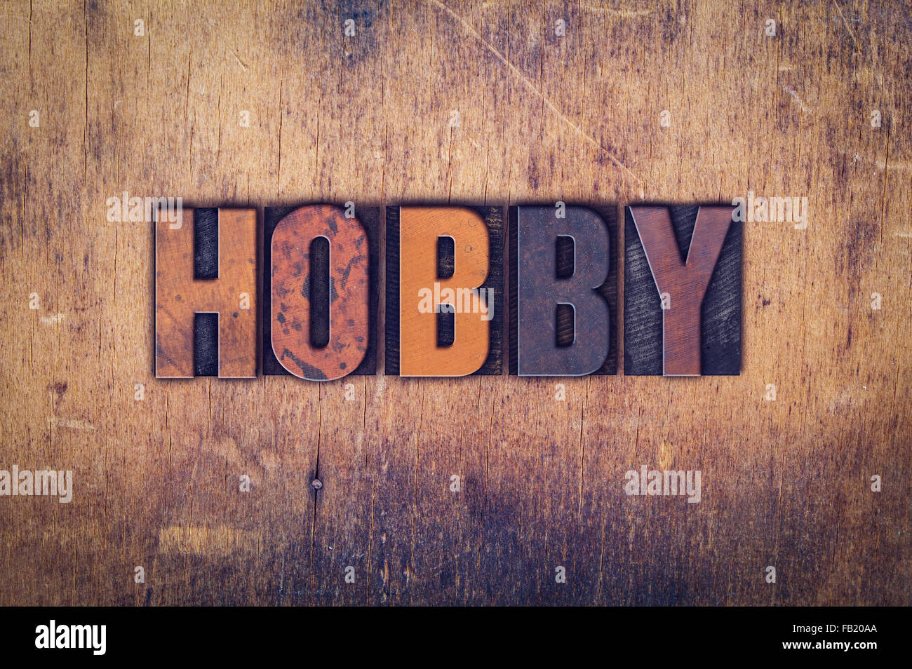 The word "Hobby" written in dirty vintage letterpress type on a aged ...
