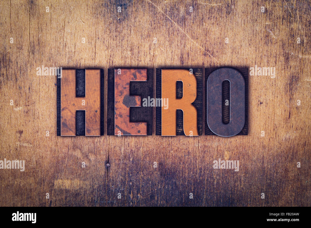 The word "Hero" written in dirty vintage letterpress type on a aged ...