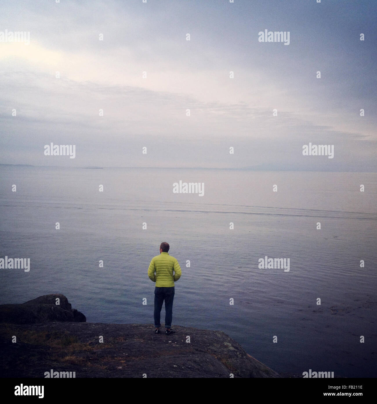 man staring at sea Stock Photo - Alamy