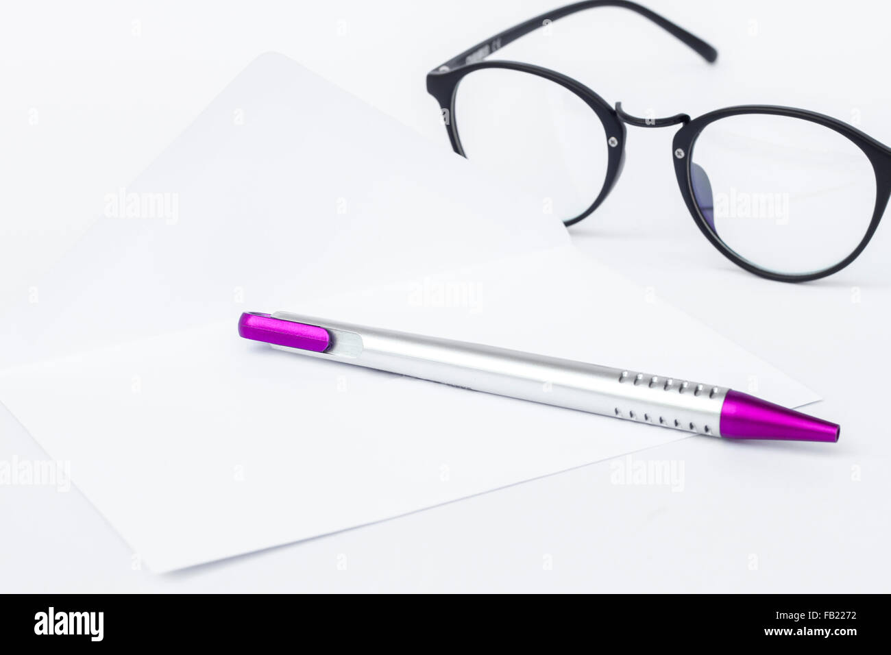 Envelope with pen isolated on white background, stock photo Stock Photo ...