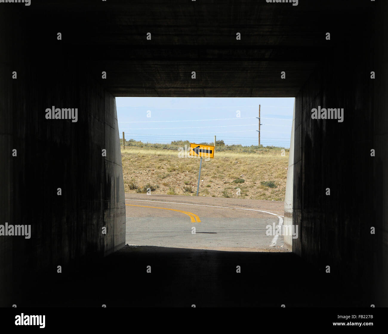 curve road sign trough tunnel Stock Photo - Alamy