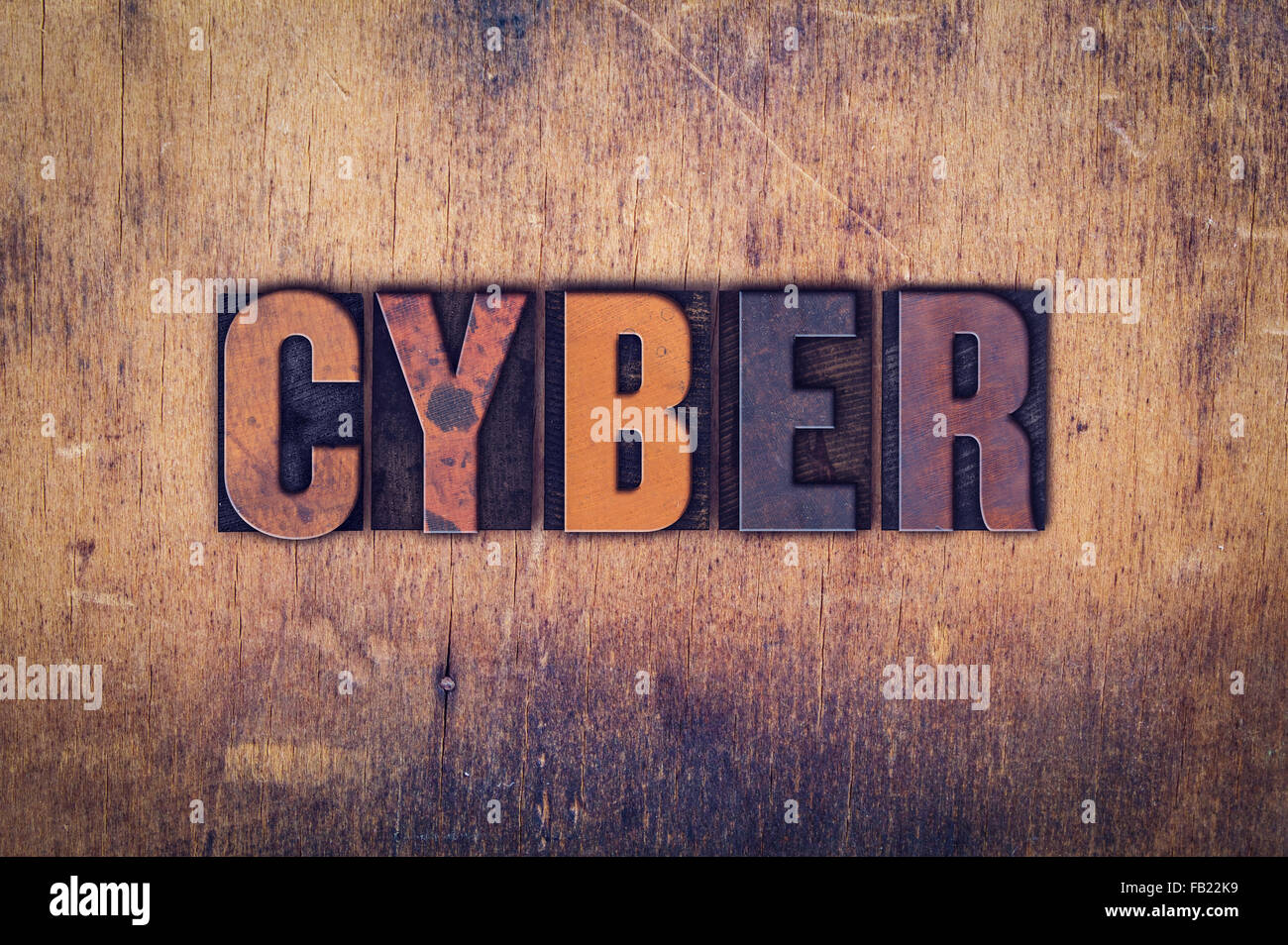 The word "Cyber" written in dirty vintage letterpress type on a aged ...