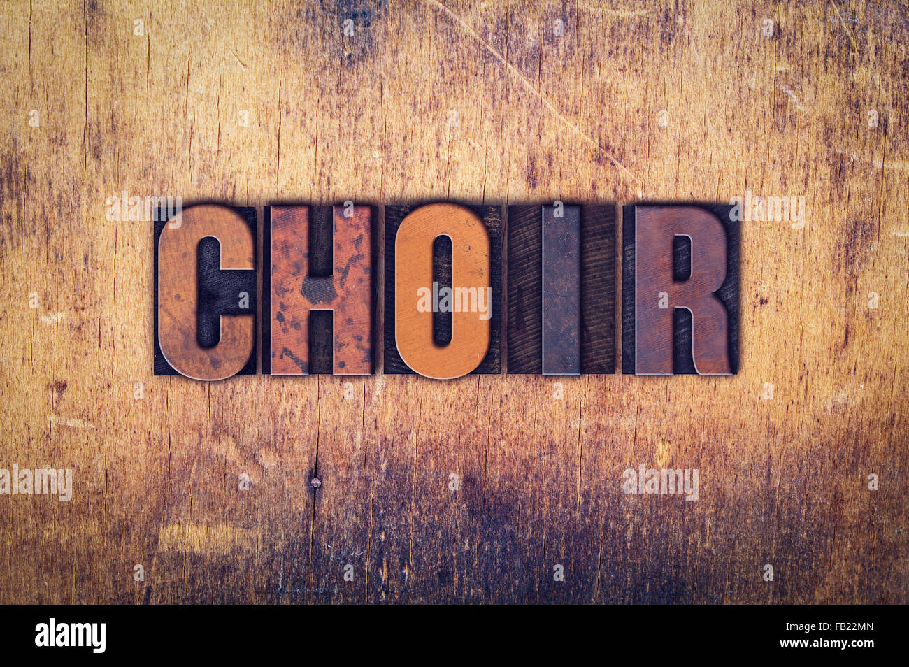 The word "Choir" written in dirty vintage letterpress type on a aged ...