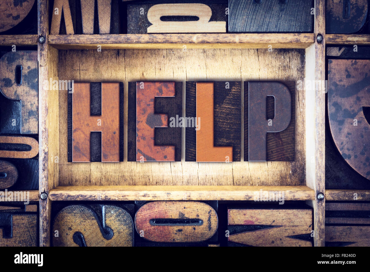 The word "Help" written in vintage wooden letterpress type Stock Photo ...