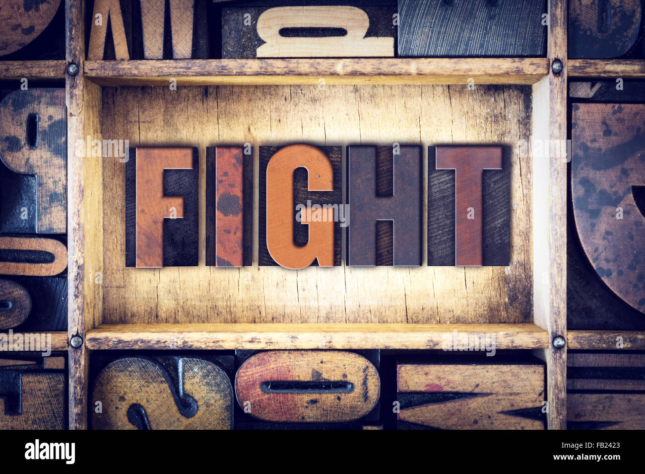 The word "Fight" written in vintage wooden letterpress type Stock Photo ...