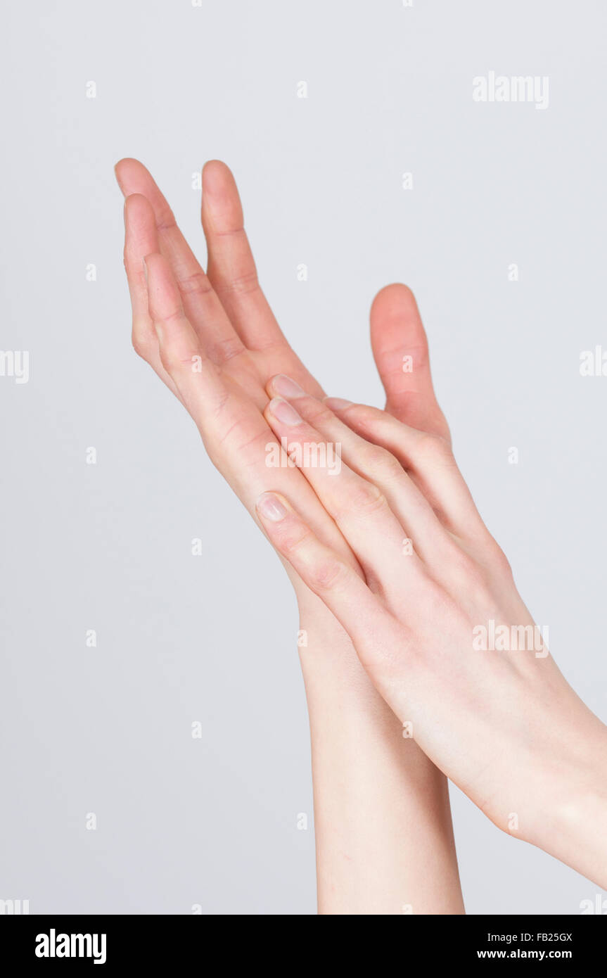 Women's hands touching hi-res stock photography and images - Alamy