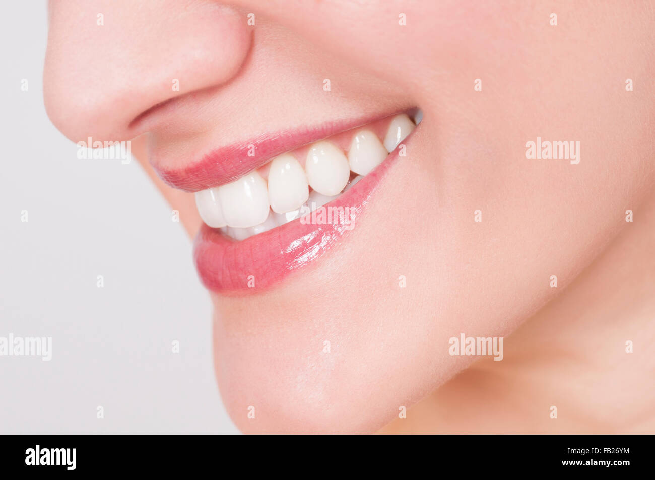 Close up of a young woman's smile with healthy teeth Stock Photo - Alamy