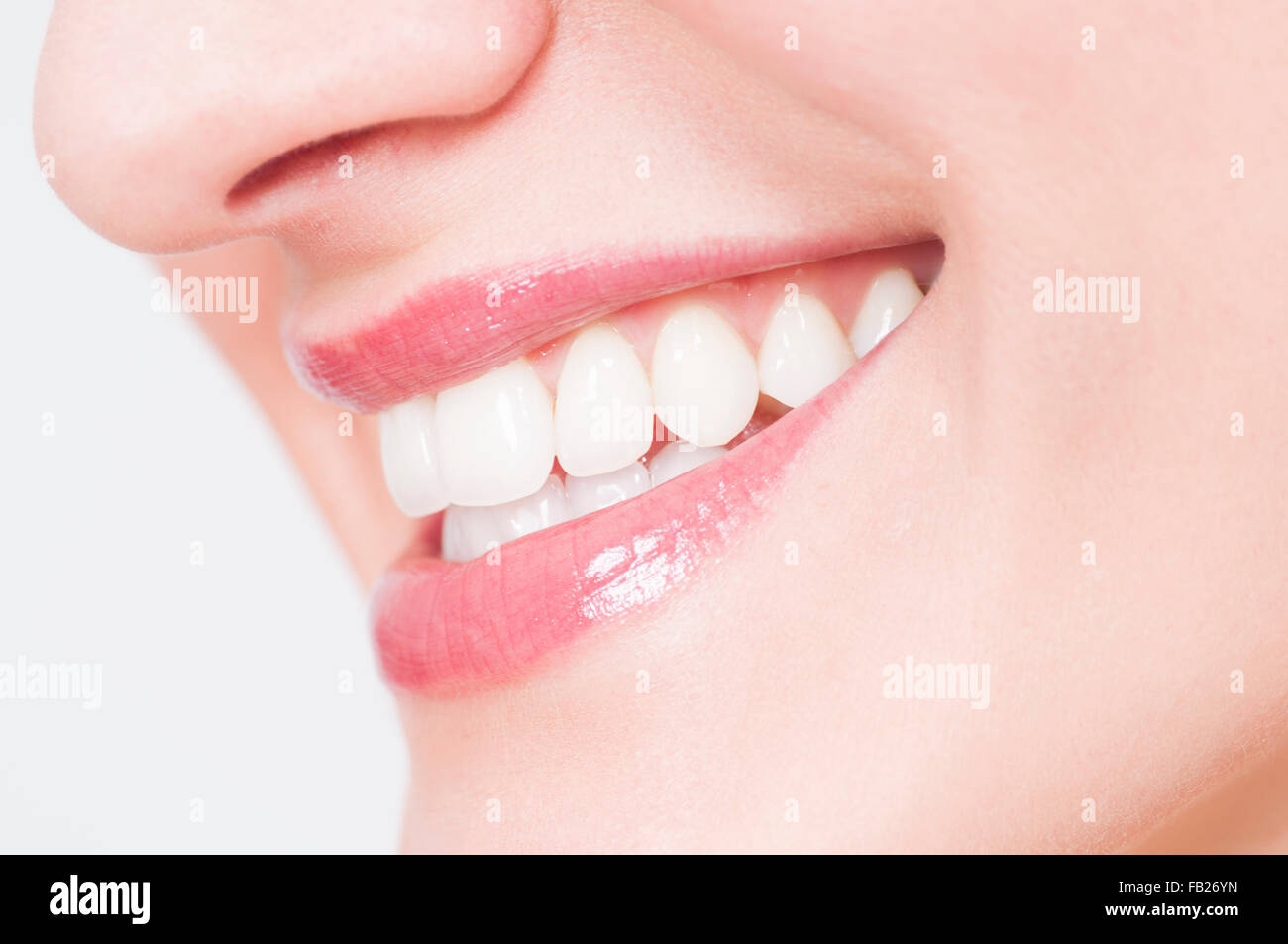 Close up of a young woman's smile with healthy teeth Stock Photo - Alamy