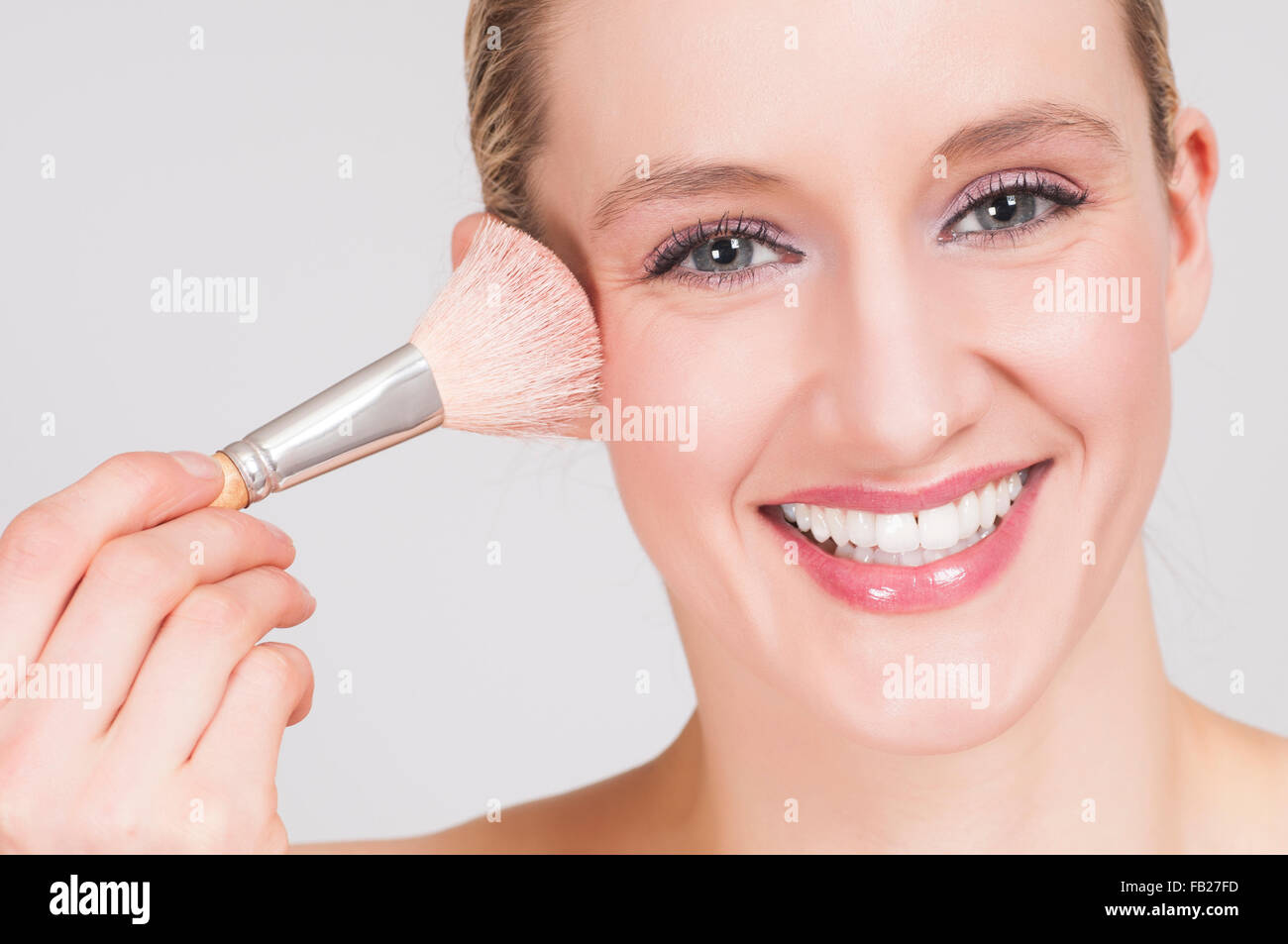 Blusher apply hi-res stock photography and images - Alamy