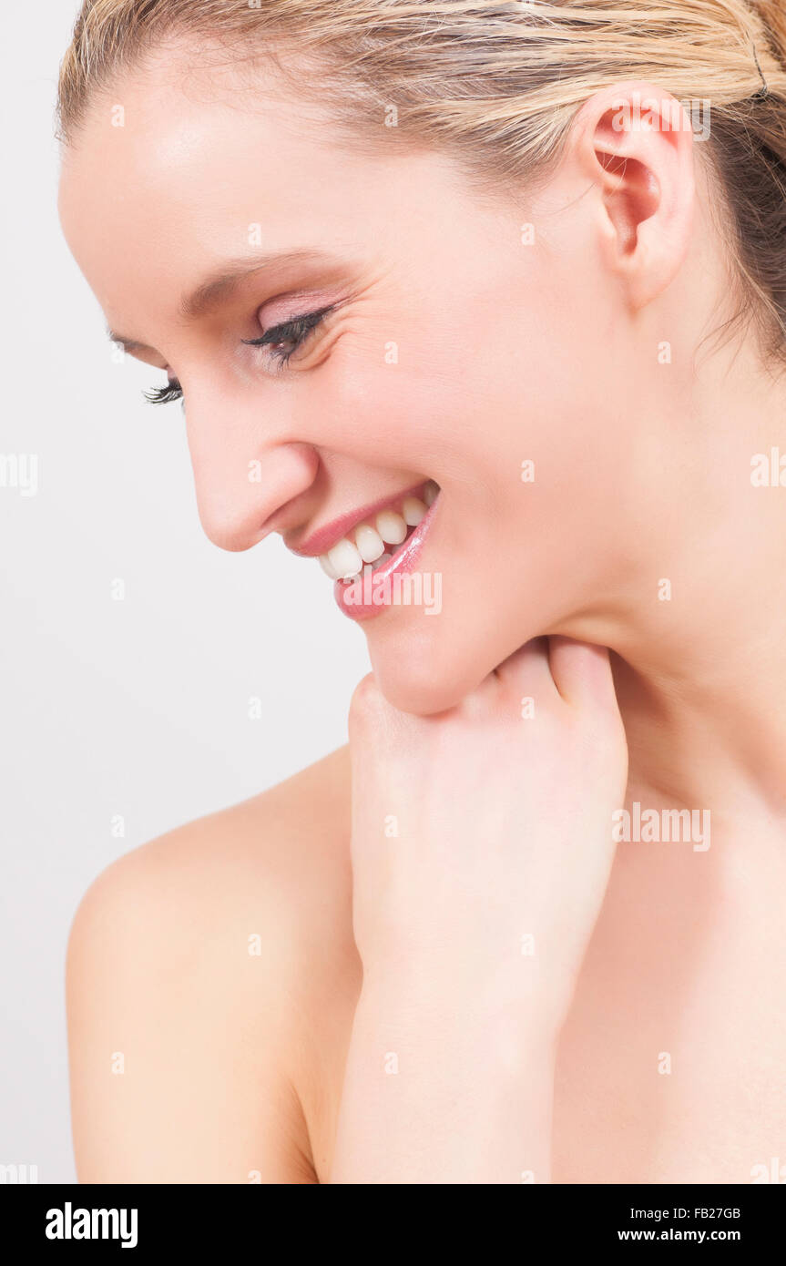 Woman hand neck smile hi-res stock photography and images - Alamy