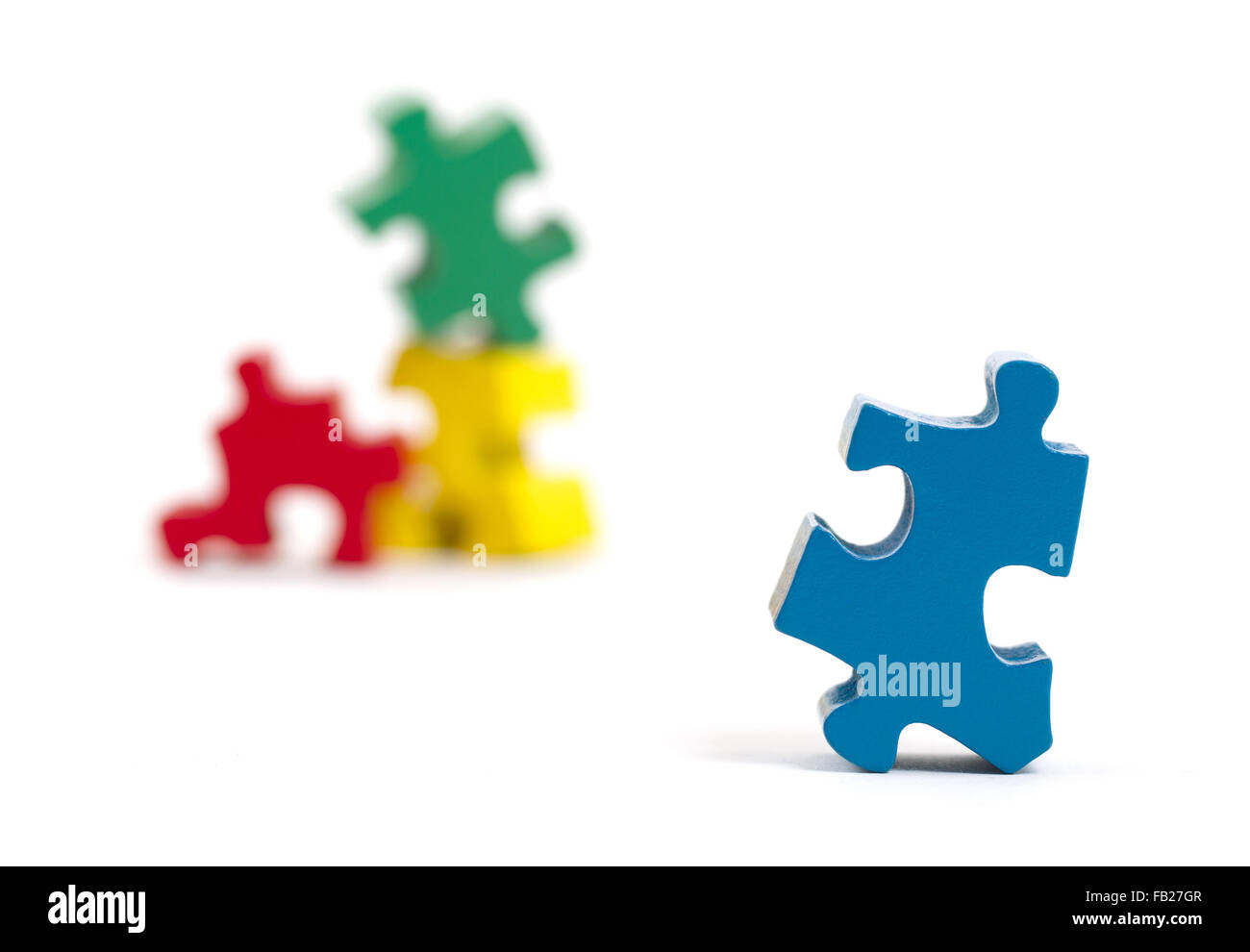 Closeup of big jigsaw puzzle piece isolated on white, perspective Stock ...