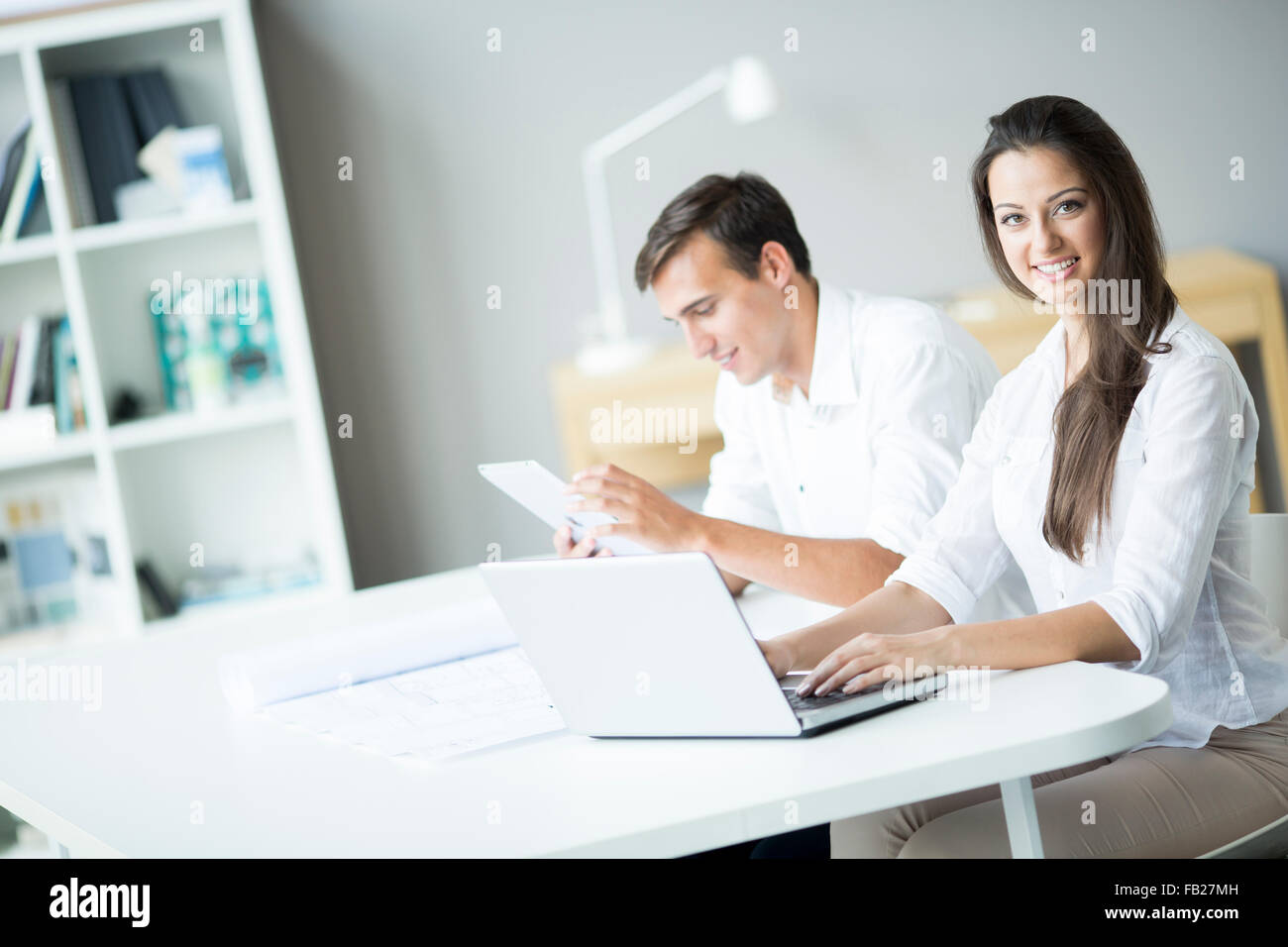 Young people in the office Stock Photo - Alamy