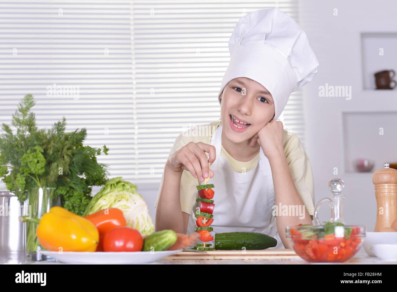 kitchen boy holding Stock Photo - Alamy