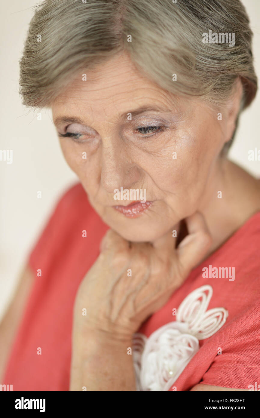 Sad senior woman Stock Photo - Alamy