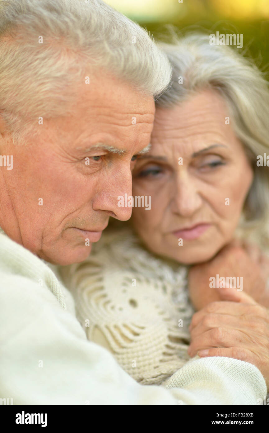 sad elder couple Stock Photo - Alamy
