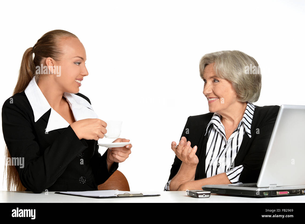 manager and her elderly customer Stock Photo - Alamy