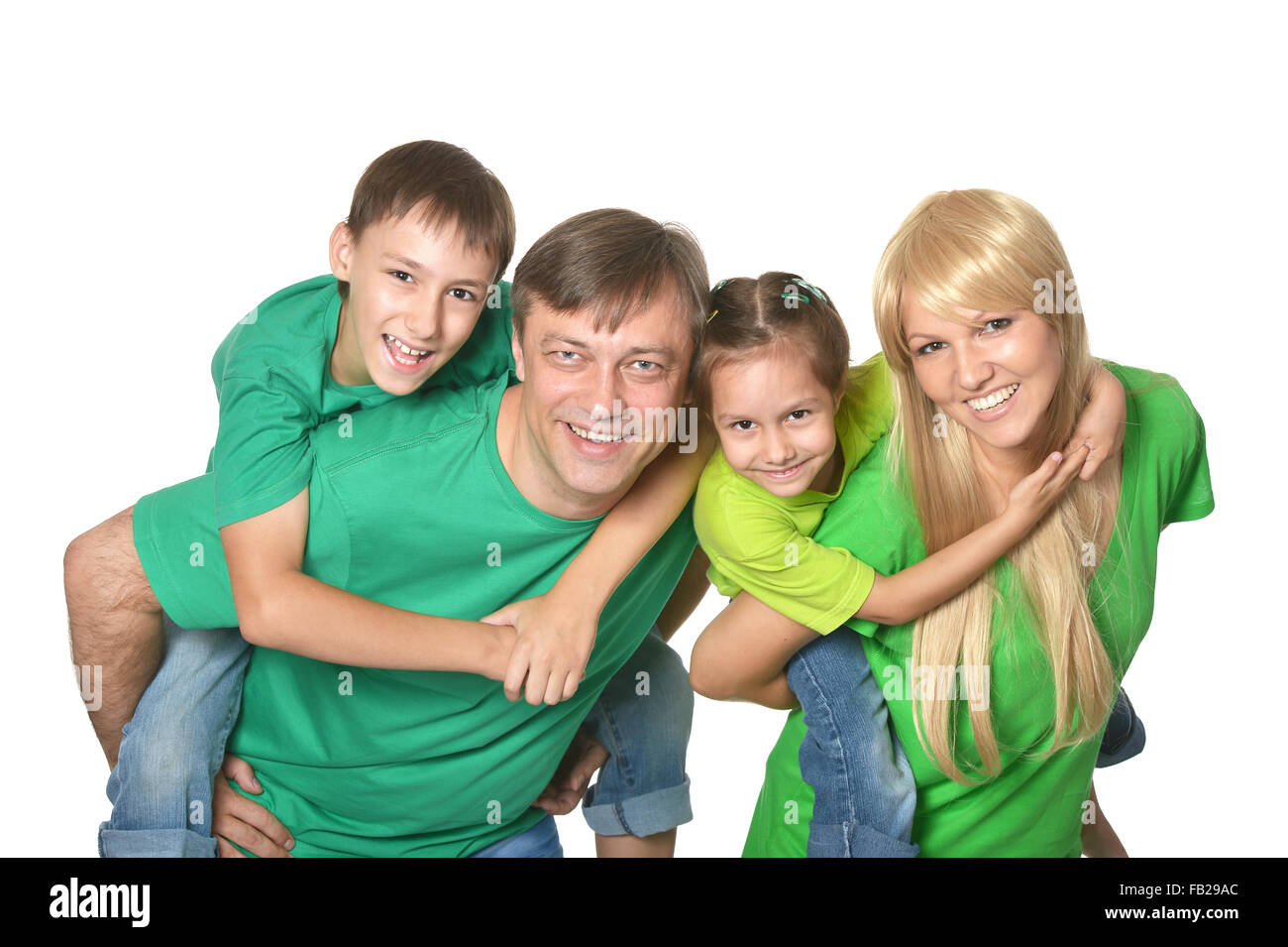 Happy family of four Stock Photo - Alamy